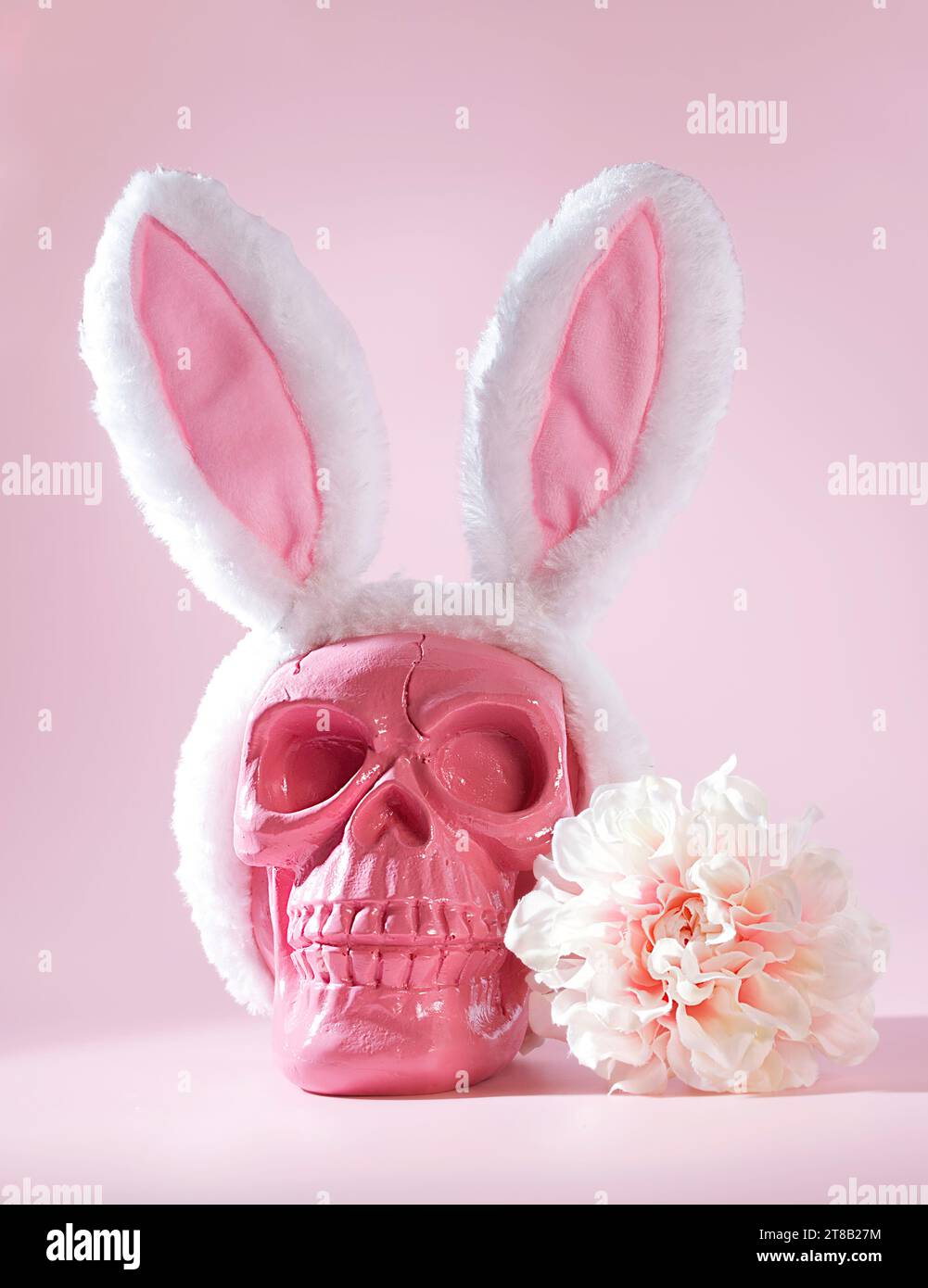 Easter's Edgy Twist: A Pastel Pink Skull Head Wearing Bunny Ears with ...