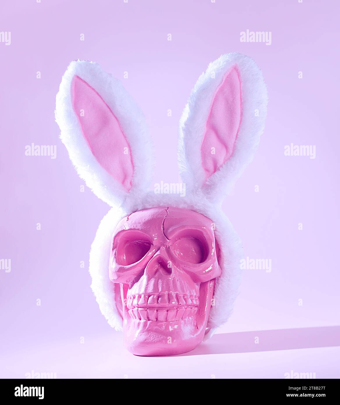 Stylish Skulls in Springtime: A Pastel Pink Skull Head with Easter ...