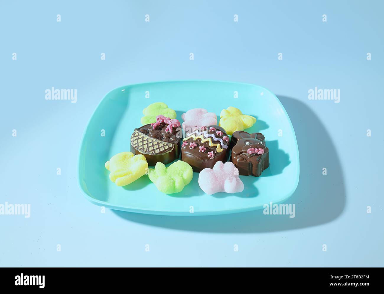 A Festive, Colorful Blue Plate of Easter Gummy Rabbits and Easter ...