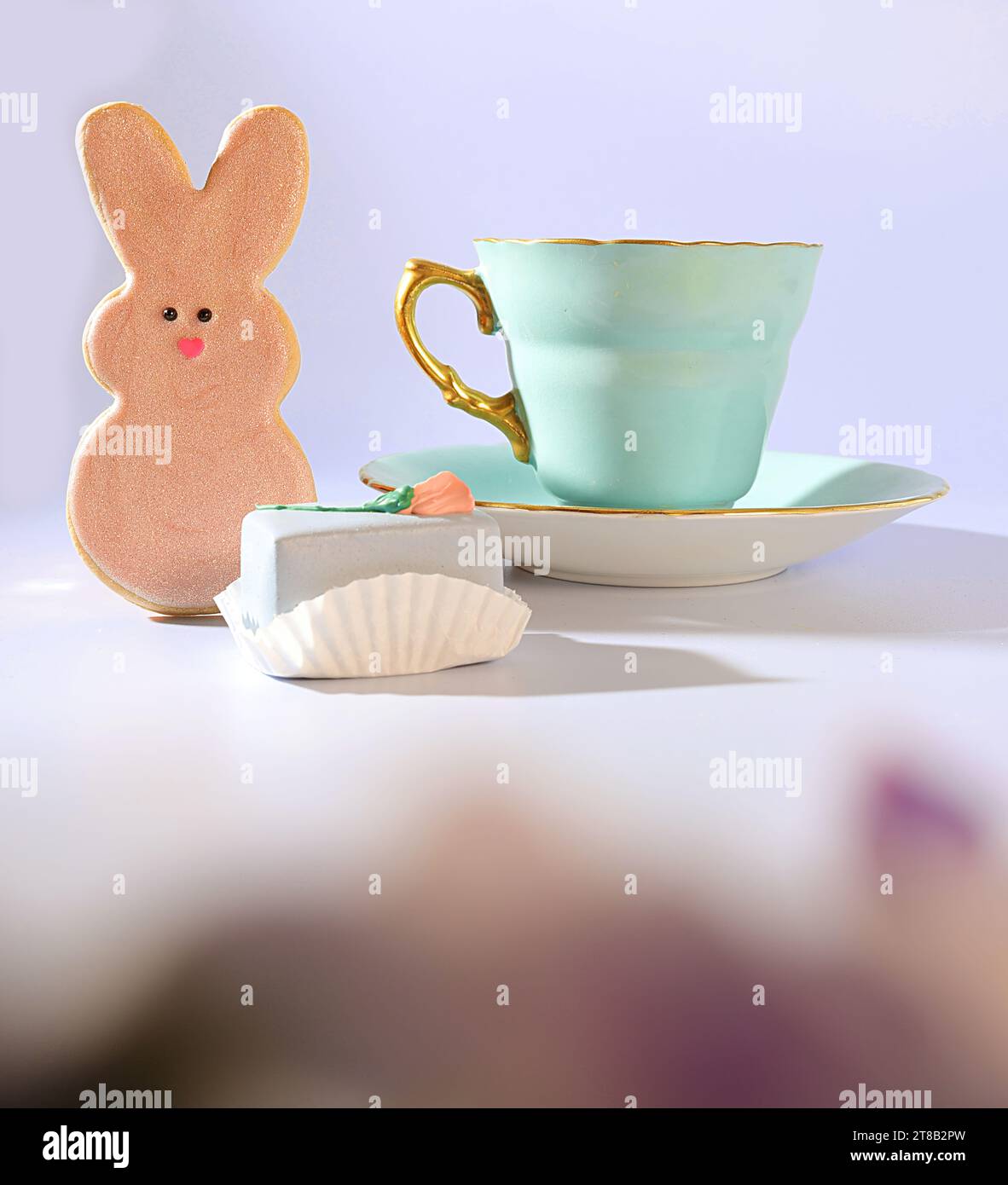 A Whimsical Easter Treat: A Pastel Green Teacup with a Gold Handle, a ...