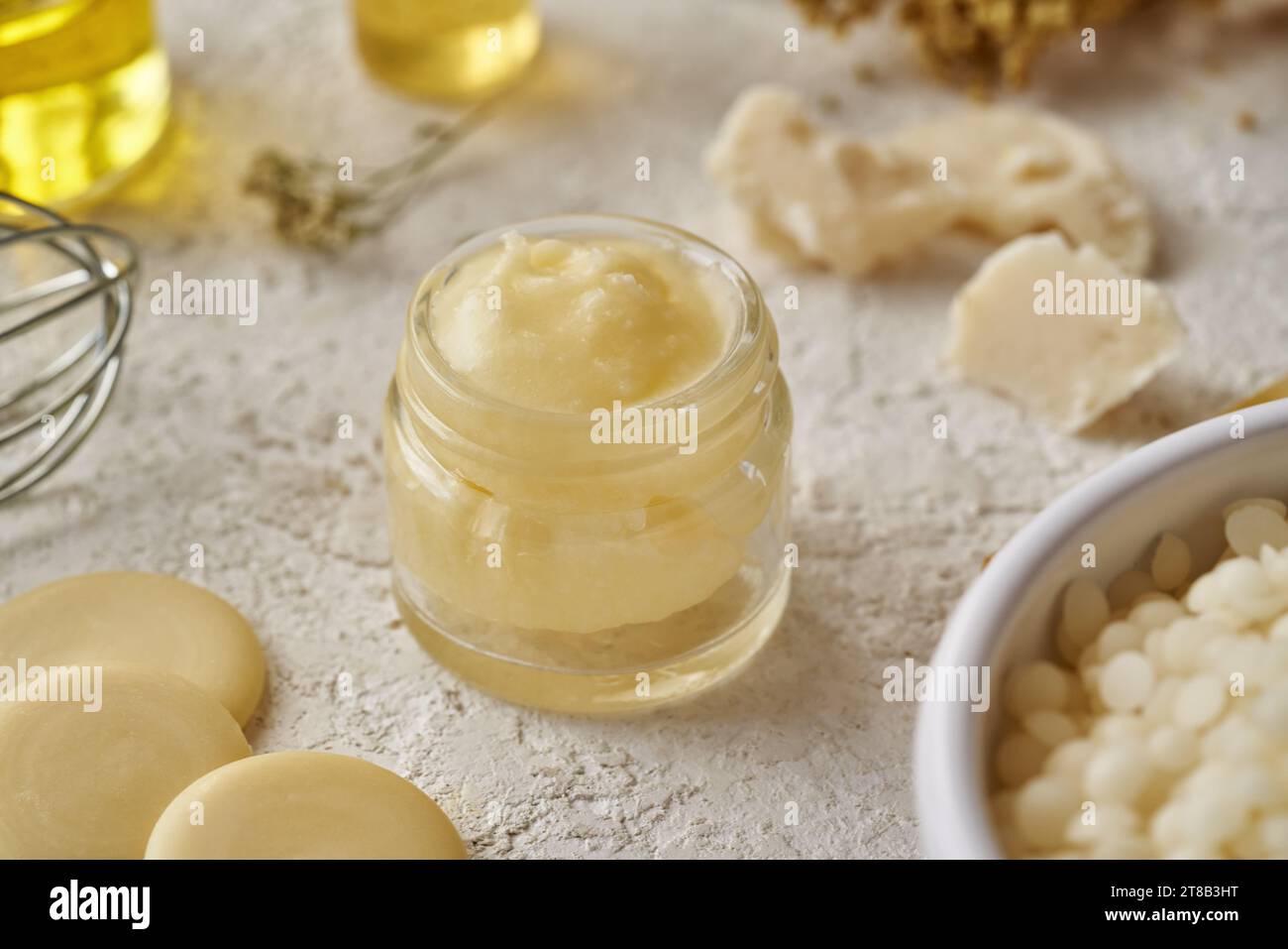 Homemade cosmetic cream made of shea butter, cocoa butter, essential ...