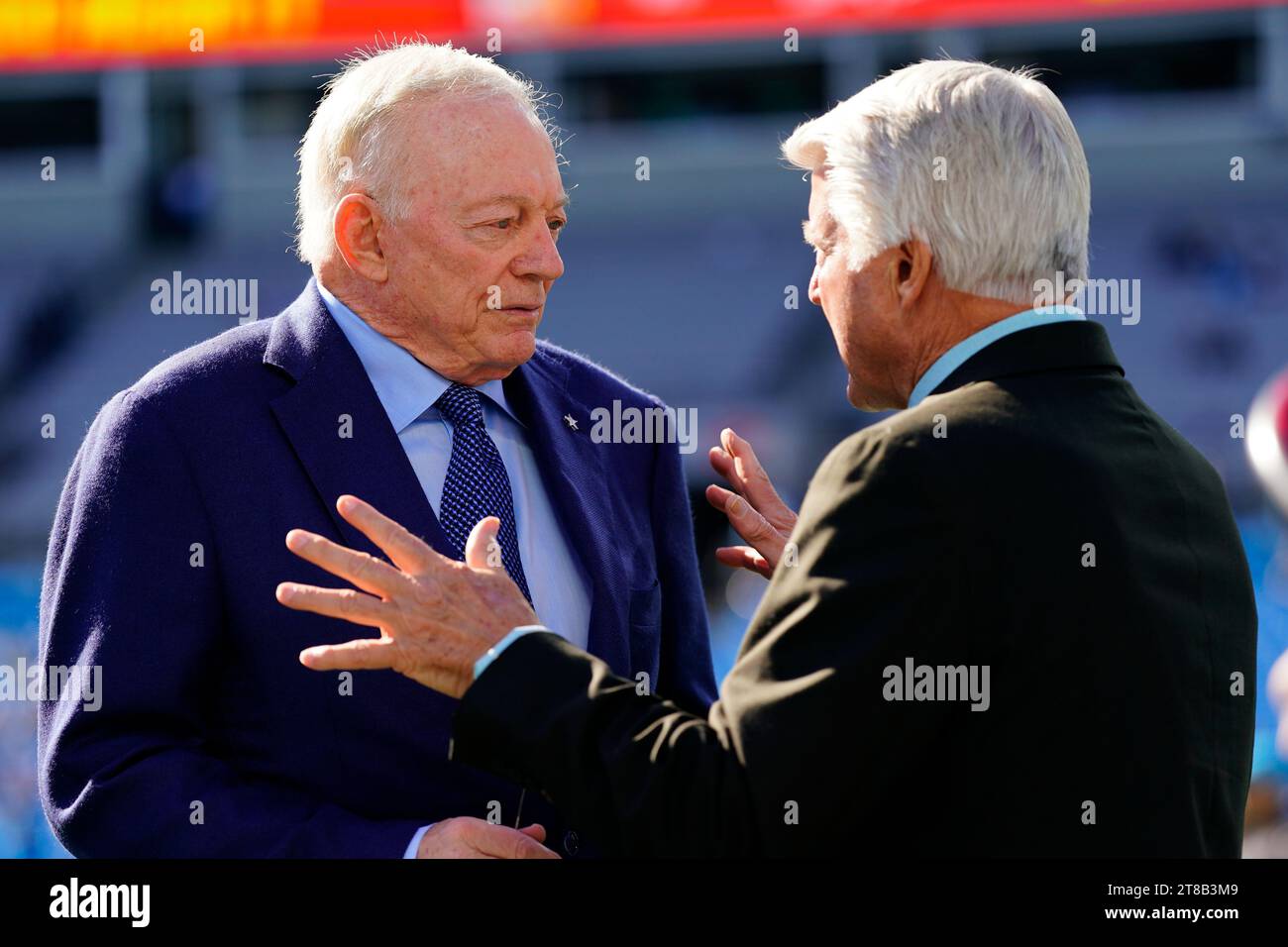 Dallas Cowboys owner Jerry Jones talks with former coach Jimmy Johnson ...