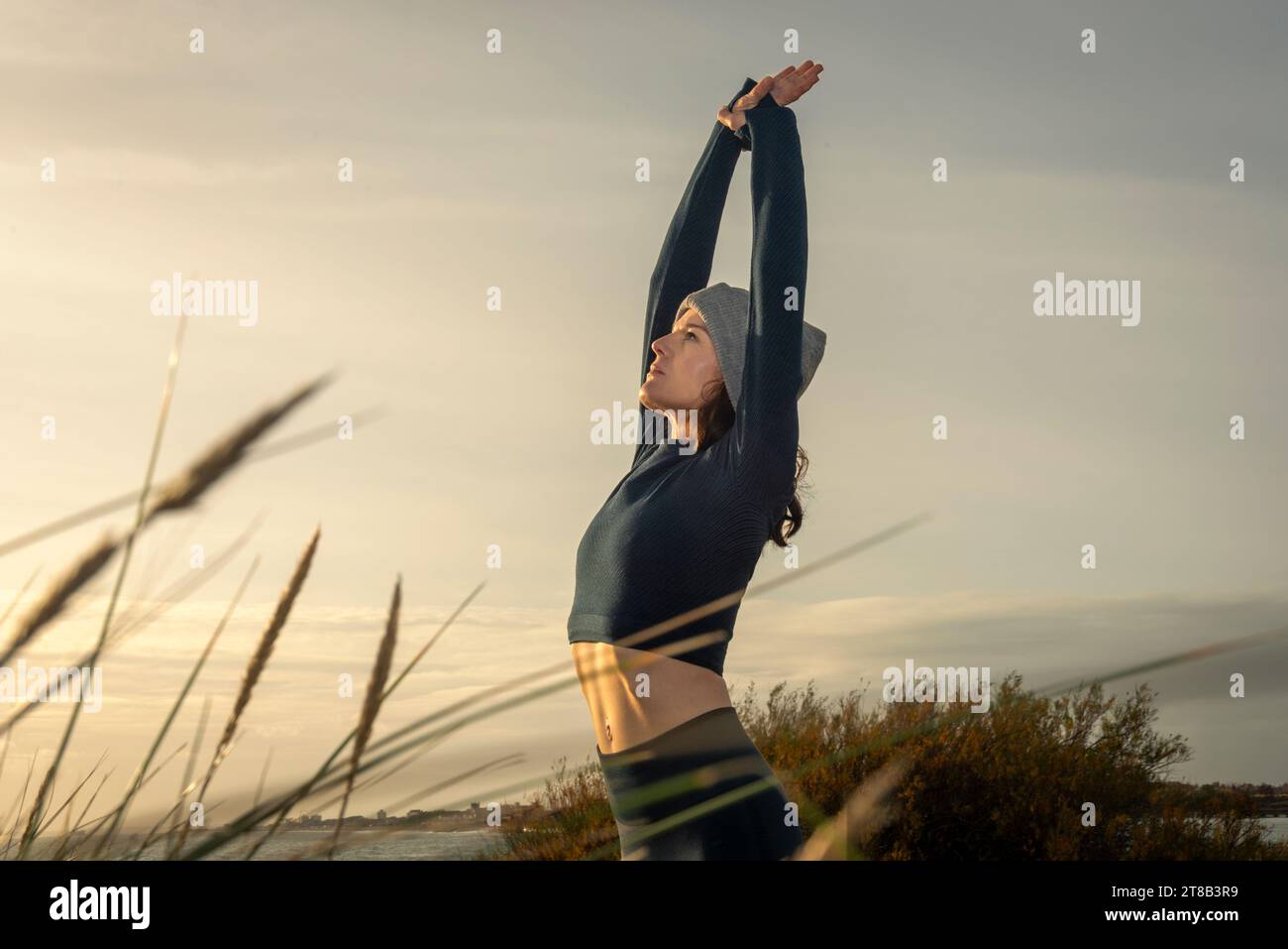 Stretch sunrise arms hi-res stock photography and images - Alamy