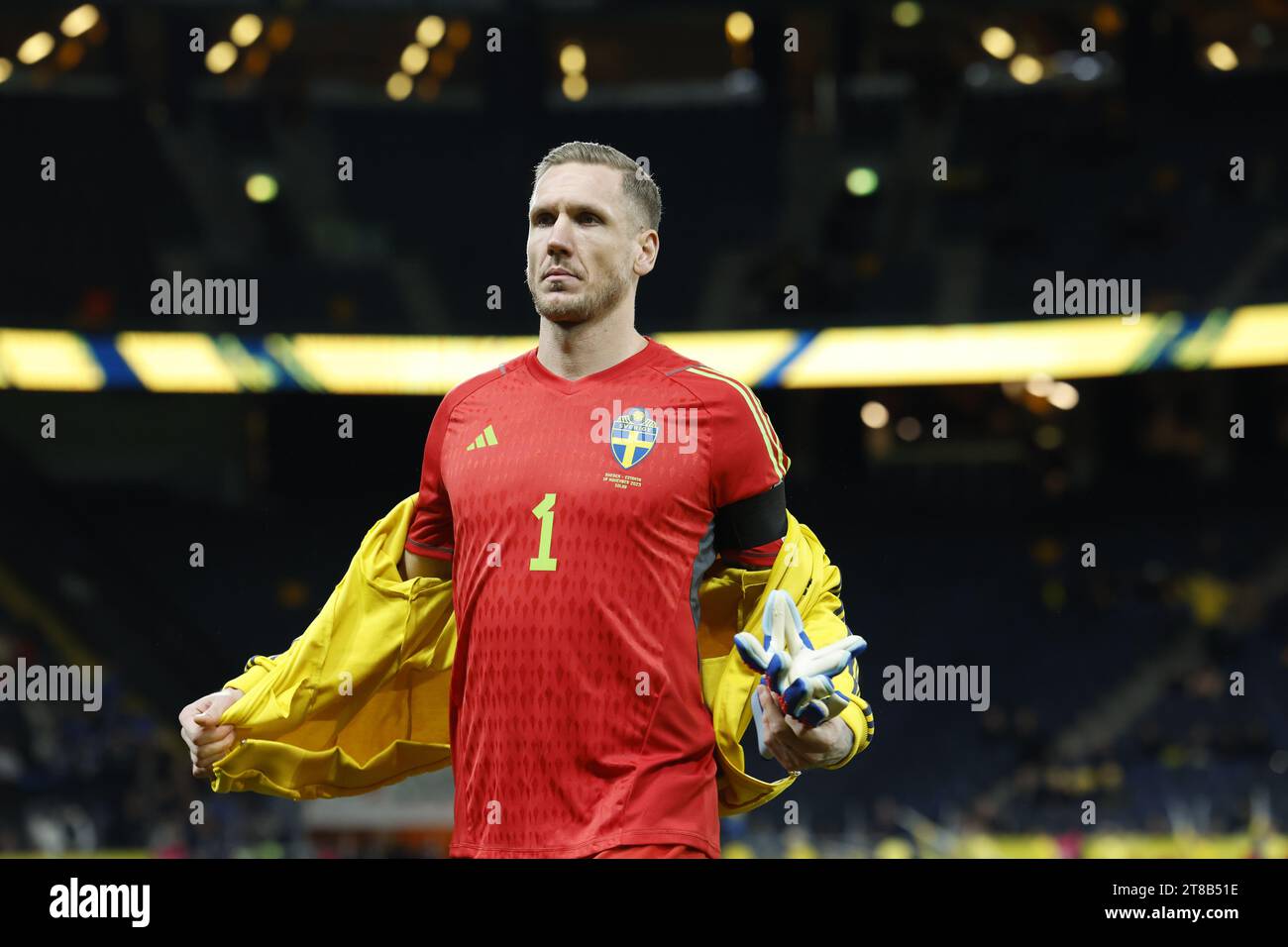 Sweden's goalkeeper Robin Olsen takes off his jacket before the UEFA ...