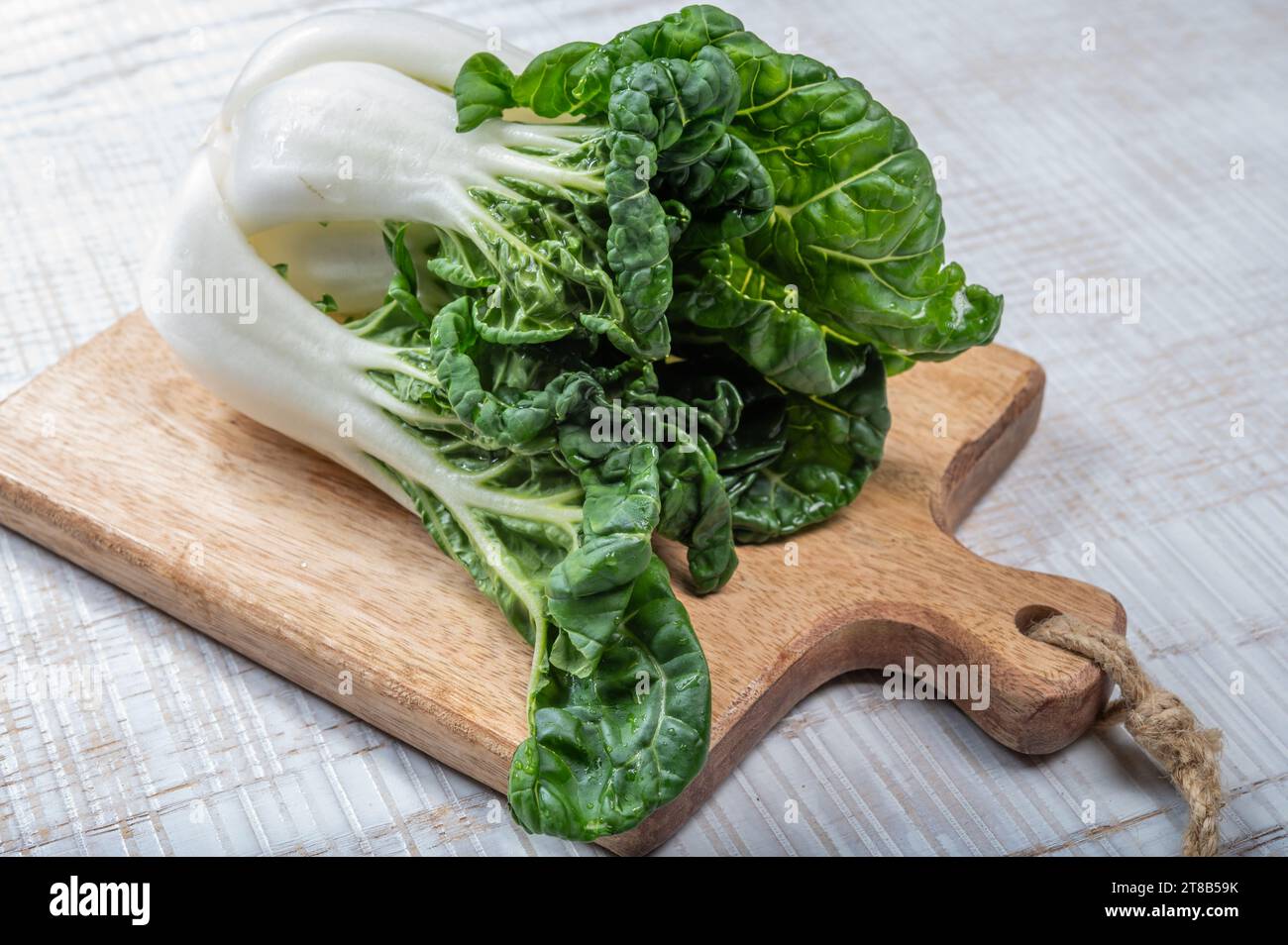 Young organic white bok choy or bak choi Chinese cabbage ready to cook ...