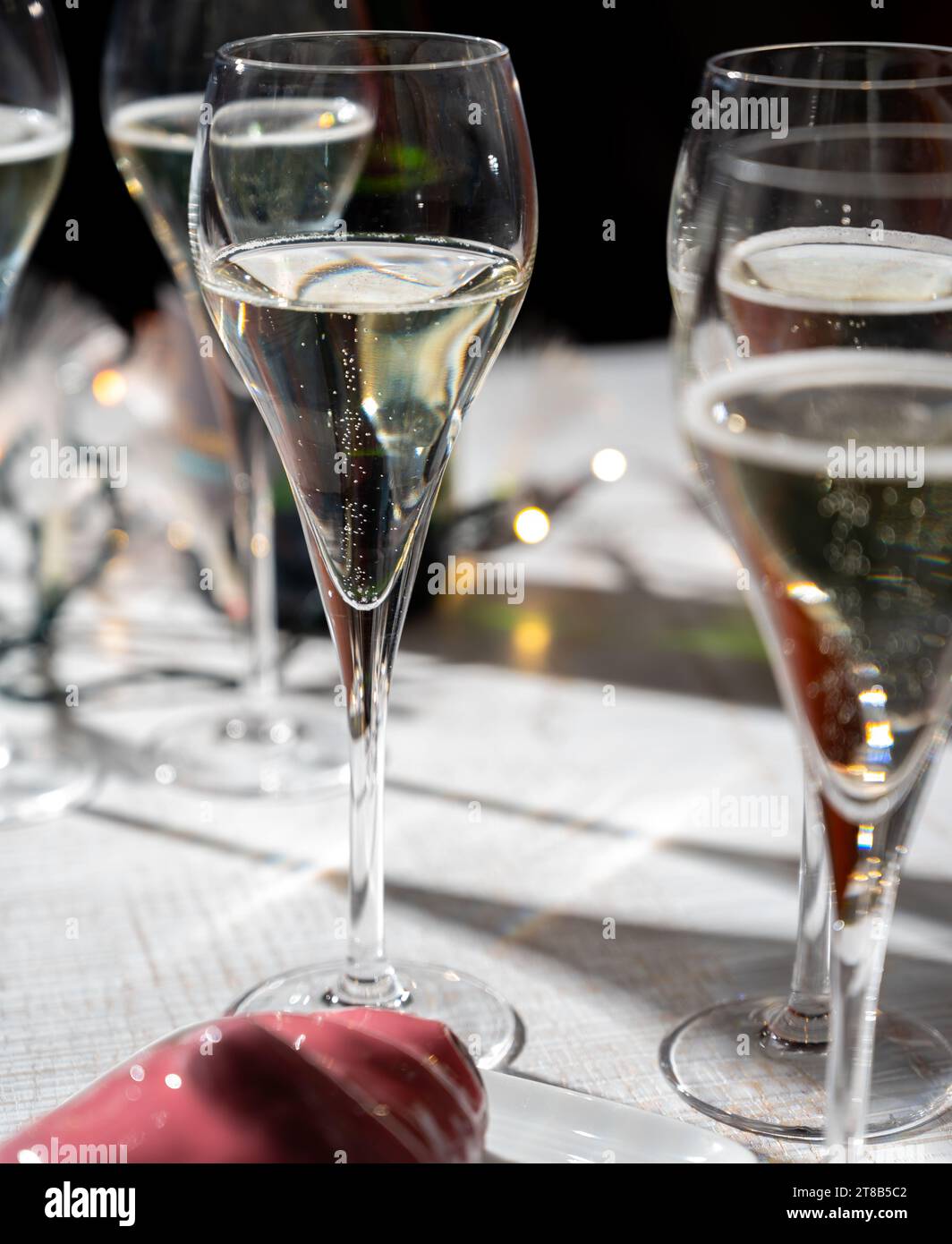 New Year Party Small Bubbles Of Brut Champagne Cava Or Prosecco Wine In Tulip Glasses With