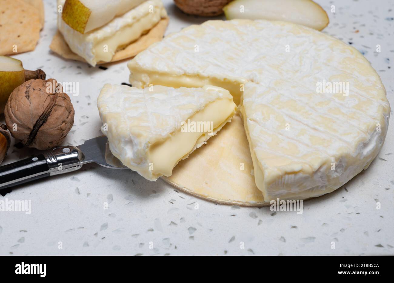 French soft Cremeux de Normandie cheese, soft creamy cheese with white ...