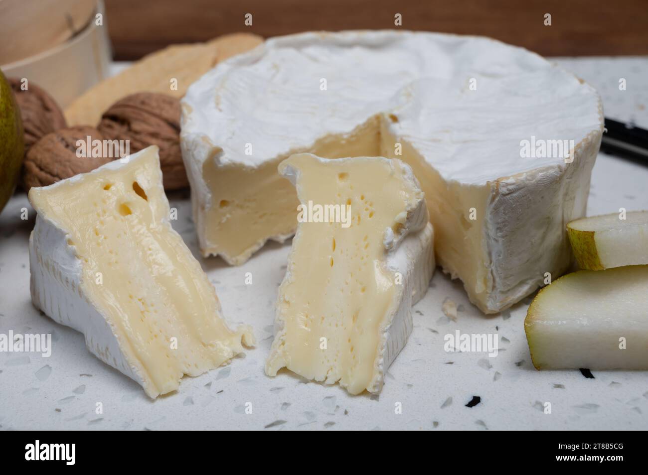 French soft Camembert cheese, original Camembert de Normandie, close up ...