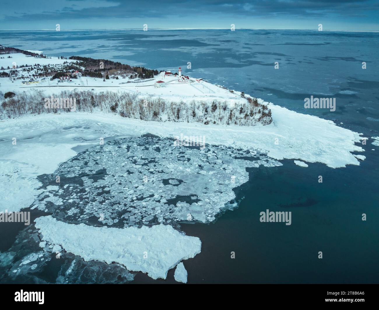 Cap de la Madeleine Lighthouse at the tip of Cap de la Madeleine on the ...