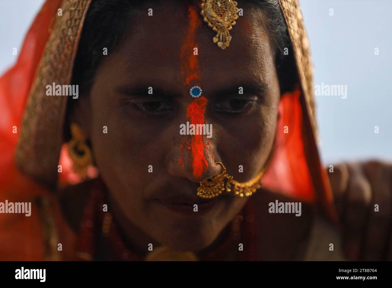 Chhath rituals in Nepal A Nepali Hindu devotee put on Sindoor over her ...