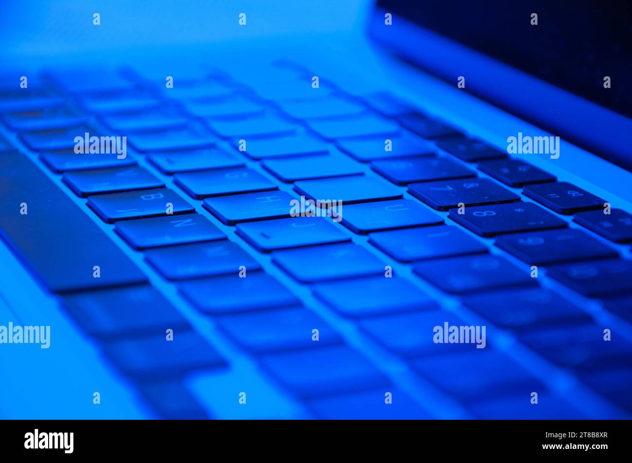 laptop keyboard close up with RGB lighting, side view Stock Photo - Alamy