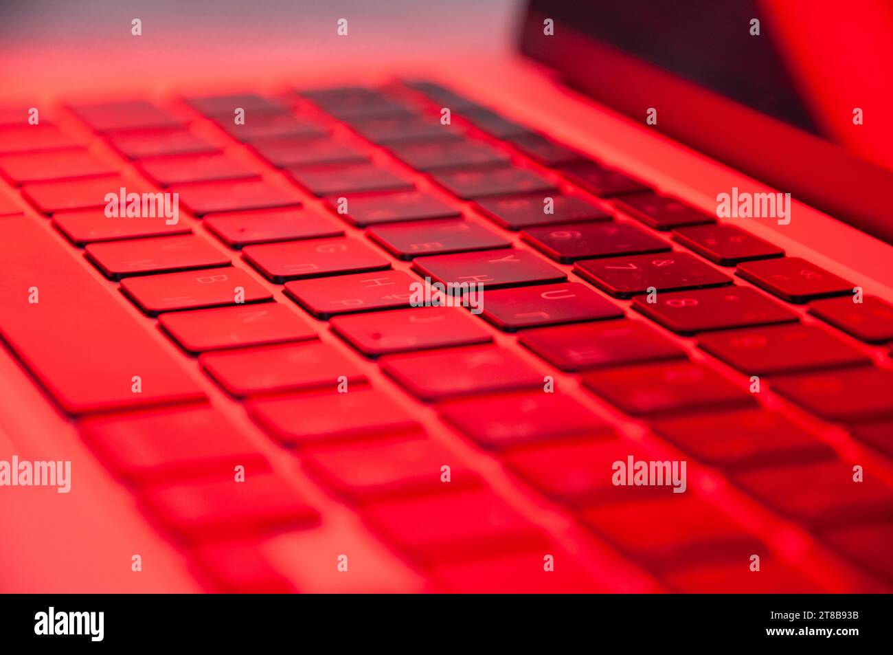 laptop keyboard close up with RGB lighting, side view Stock Photo - Alamy