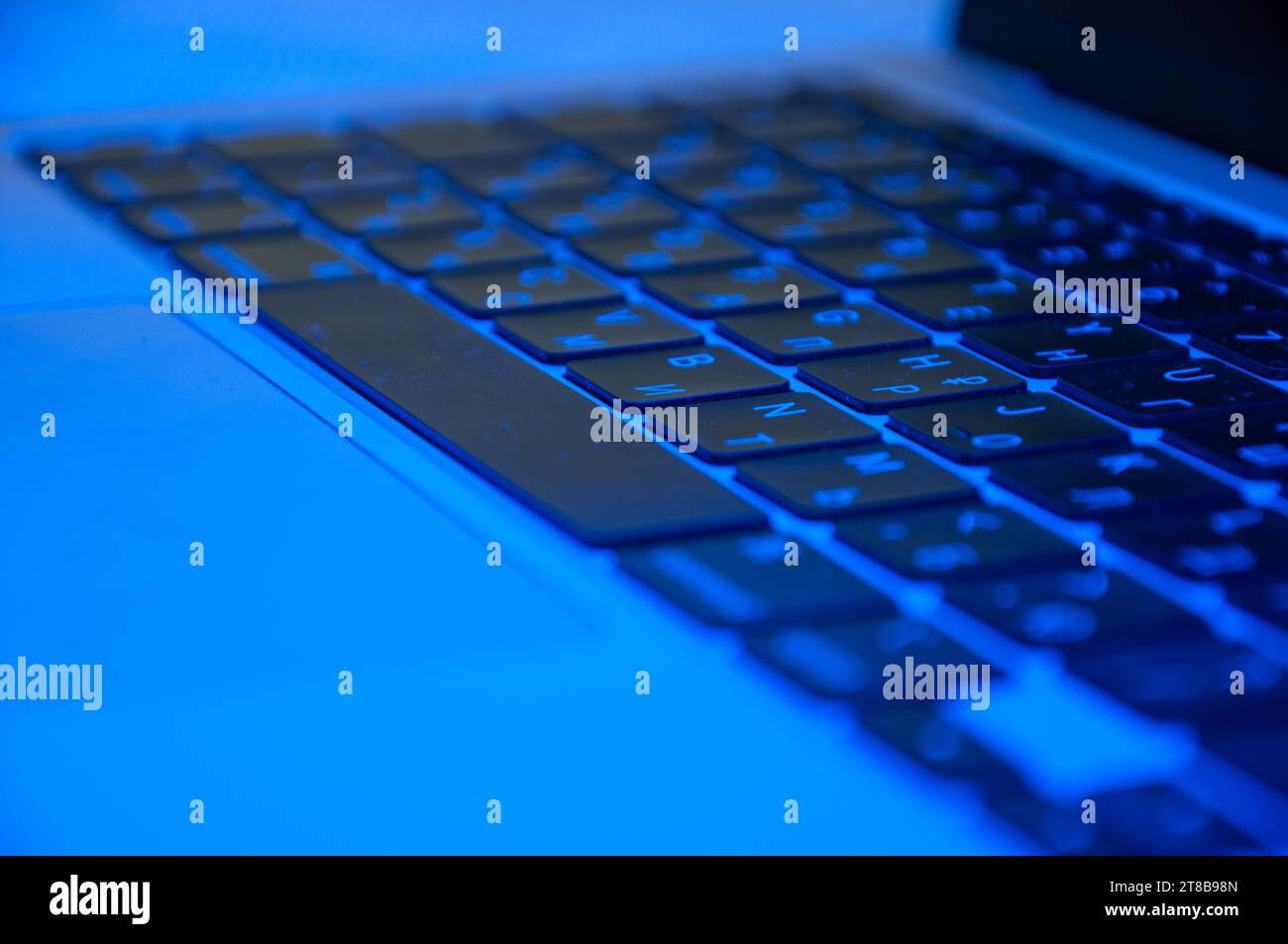 keyboard close-up with RGB backlight blurred background Stock Photo - Alamy