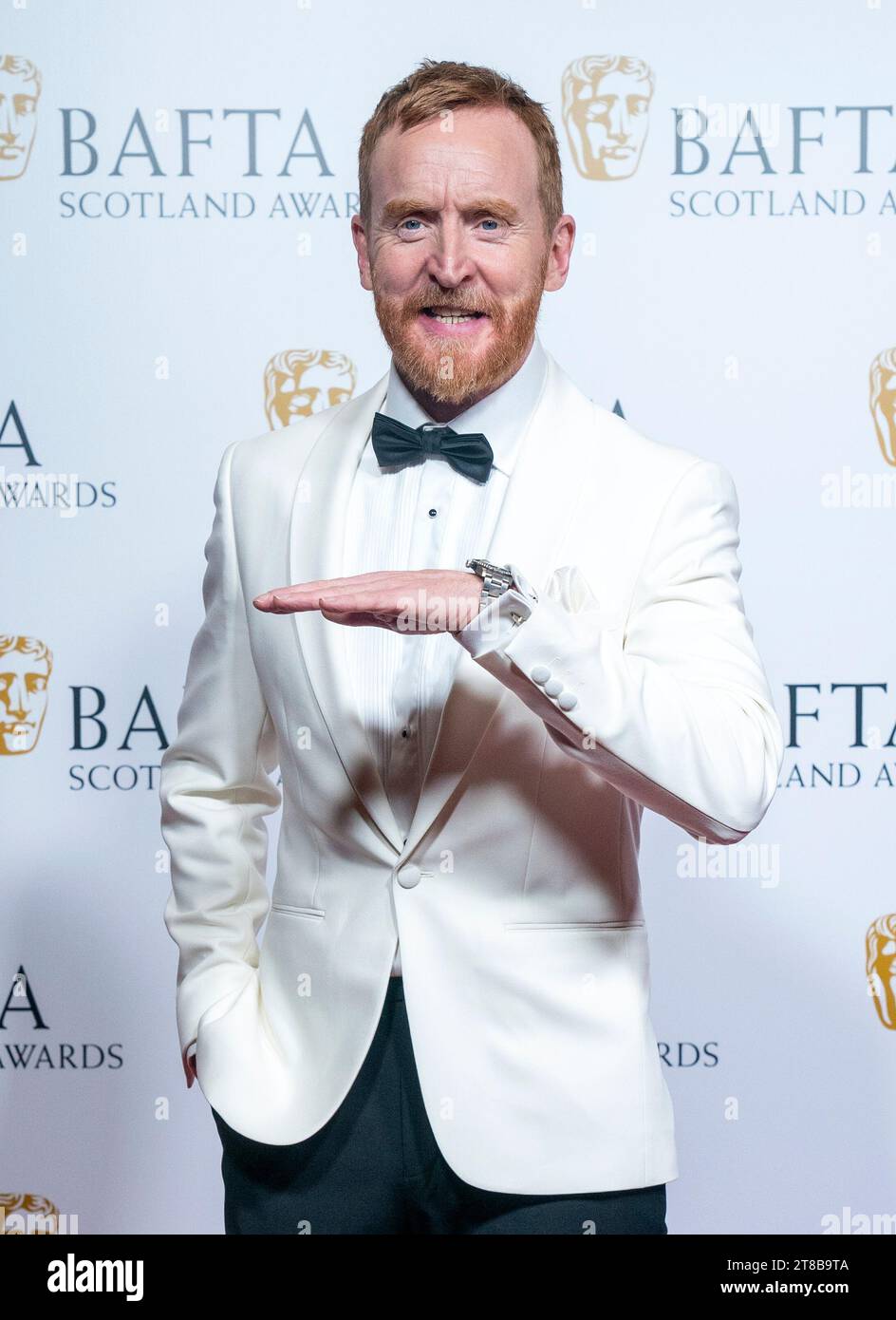Actor Tony Curran on the red carpet at the Bafta Scotland award ...