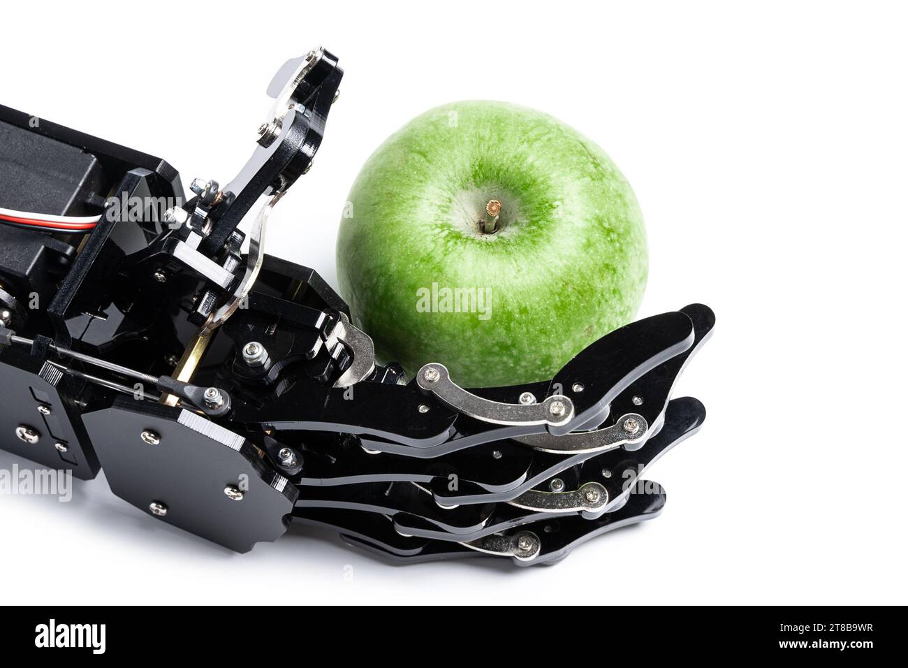 Real robot's hand with green apple. Concept of Artificial intelligence ...