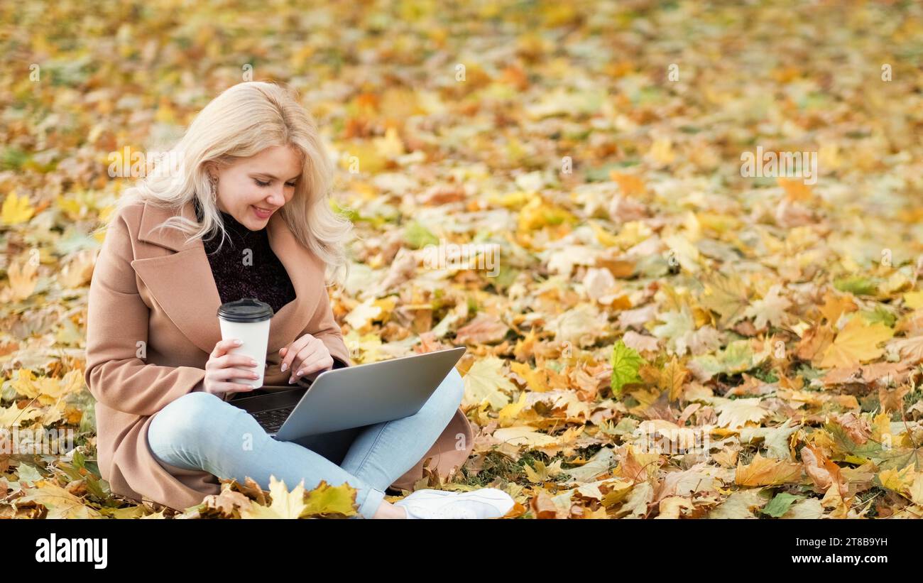 Online communication happy woman inspired autumn Stock Photo - Alamy