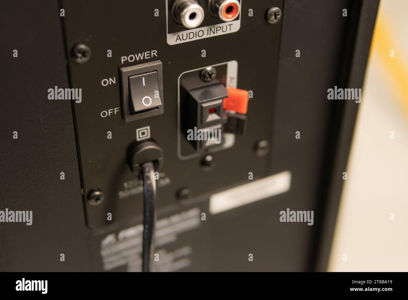 Close-up of the speaker connectors on the back of the AV receiver. High ...