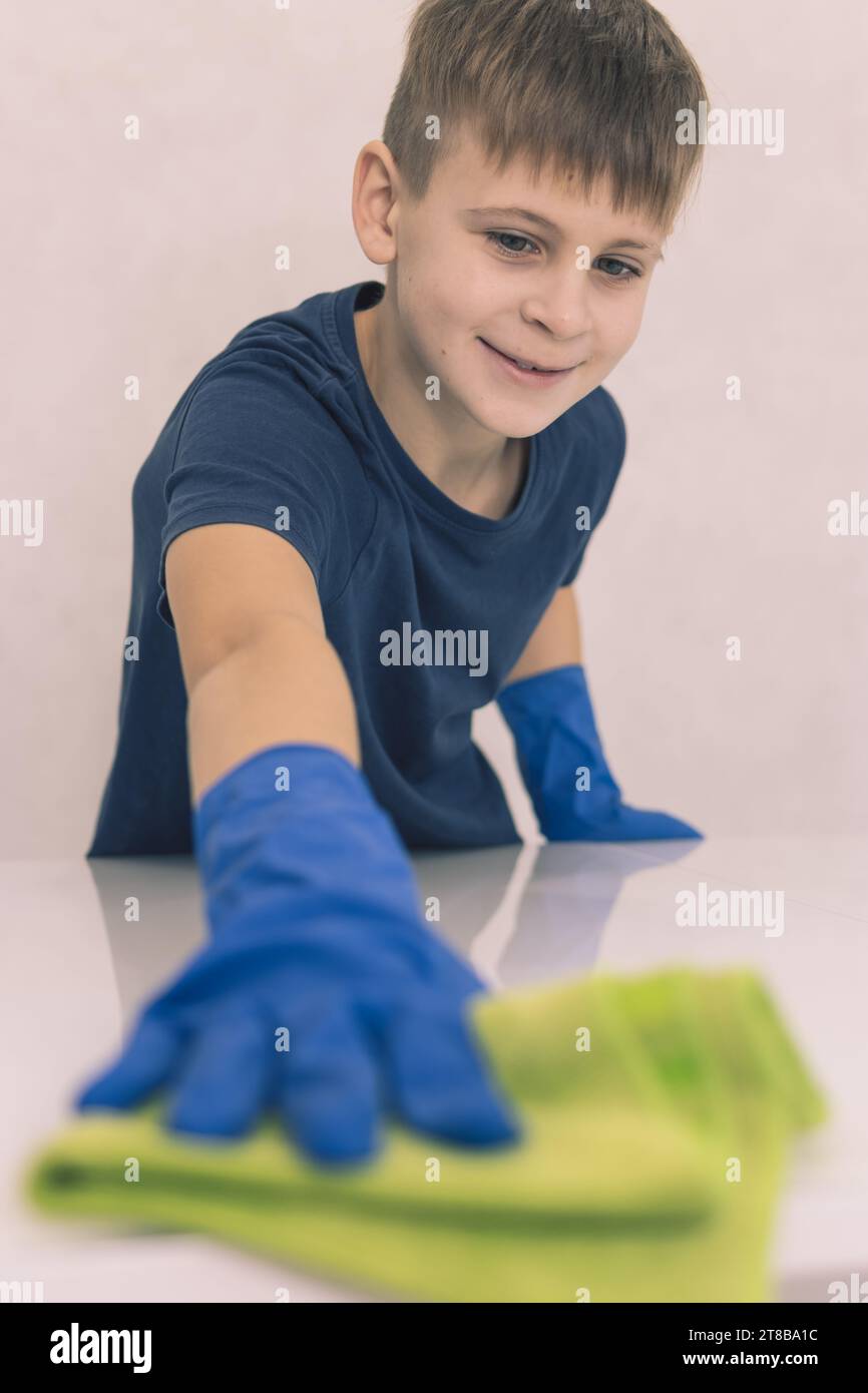 Boy sweeping a room hi-res stock photography and images - Alamy