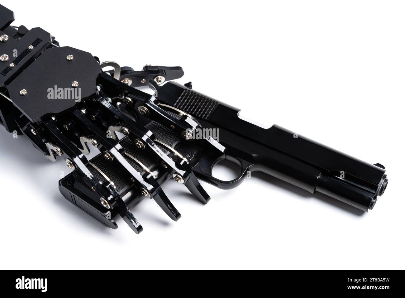 Real robot's hand with handgun. Concept of AI takeover and ...