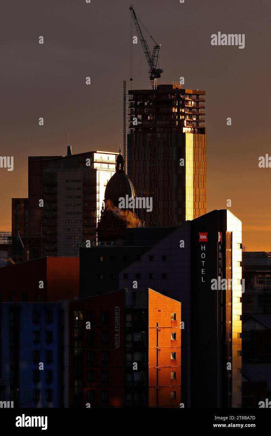 Sunrise at Leeds Town Hall surrounded by modern tall buildings Stock ...