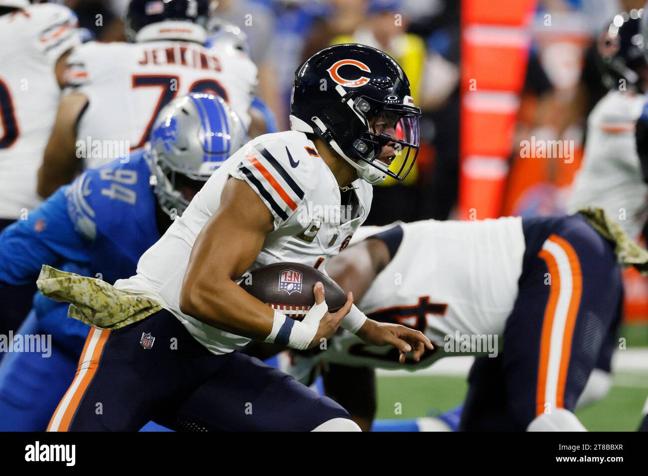 Chicago Bears quarterback Justin Fields rushes during the first half of ...