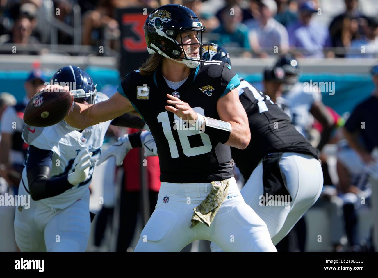 Jacksonville Jaguars quarterback Trevor Lawrence (16) looks to throw a ...