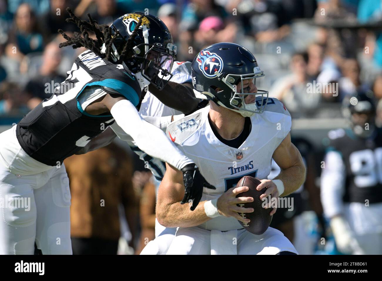 Jacksonville Jaguars cornerback Tre Herndon, left, pressures Tennessee ...