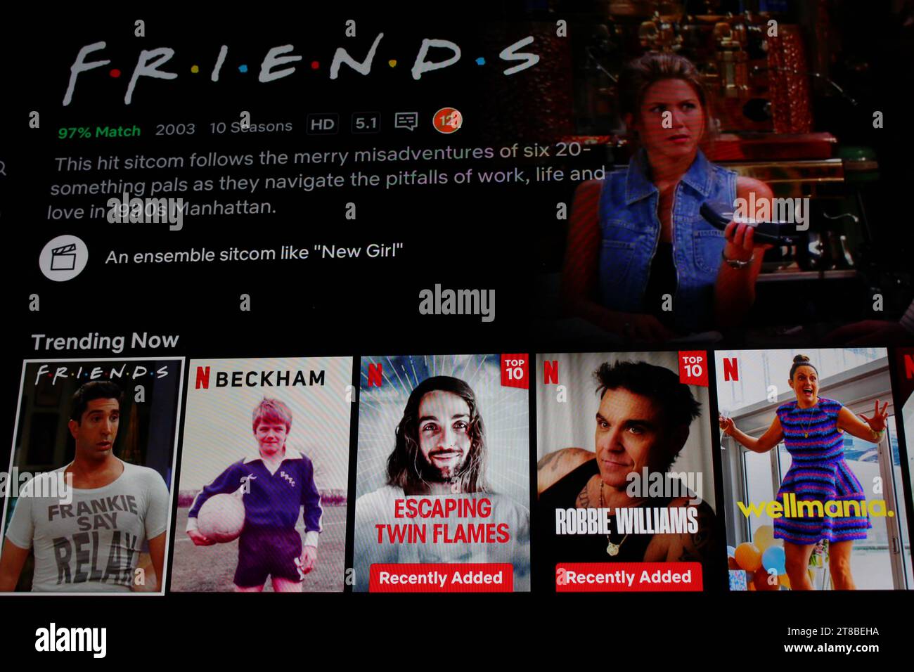 Netflix app on tv screen showing the TV show Friends Stock Photo - Alamy