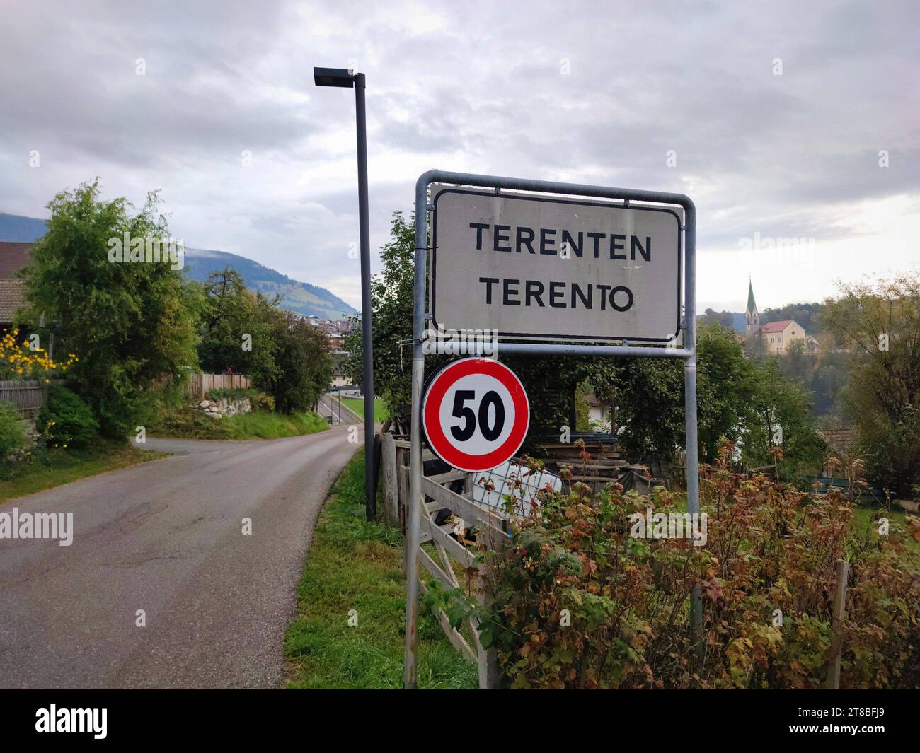 Name board of the village of Terenten (Italian: Terento) in the Alps of ...