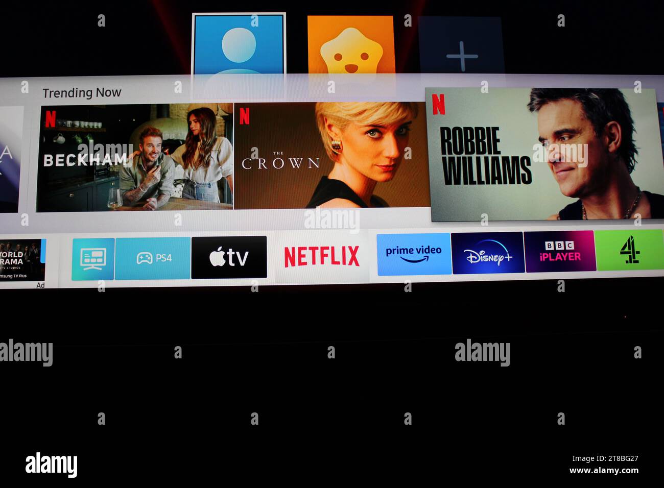 Trending series of Netflix being shown on a smart tv - Beckham, The ...