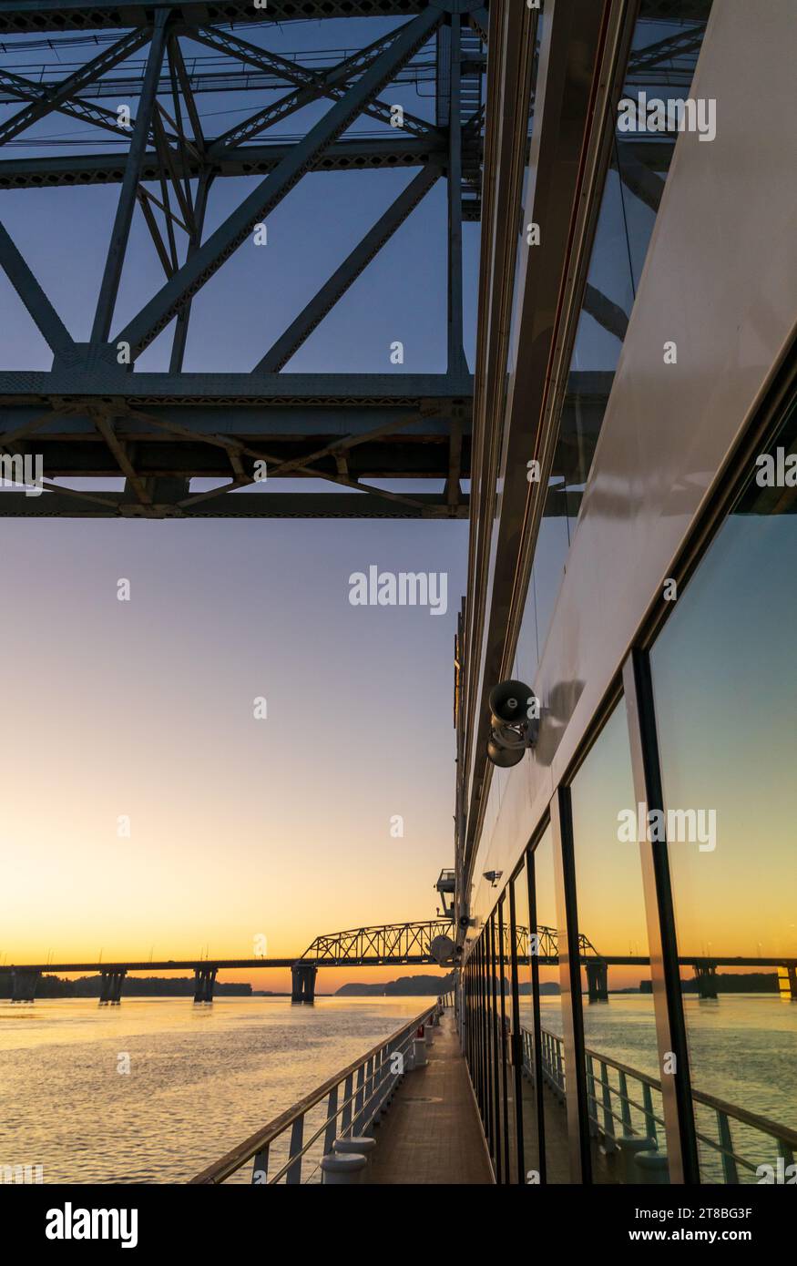Mississippi river cruise boat sails under Wabash Railroad bridge ...