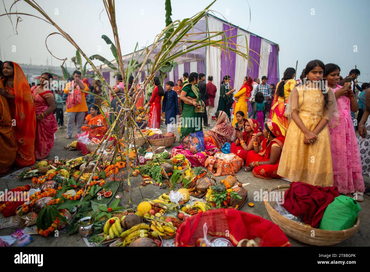 Devotees gather to perform rituals on the banks of the Yamuna River at ...