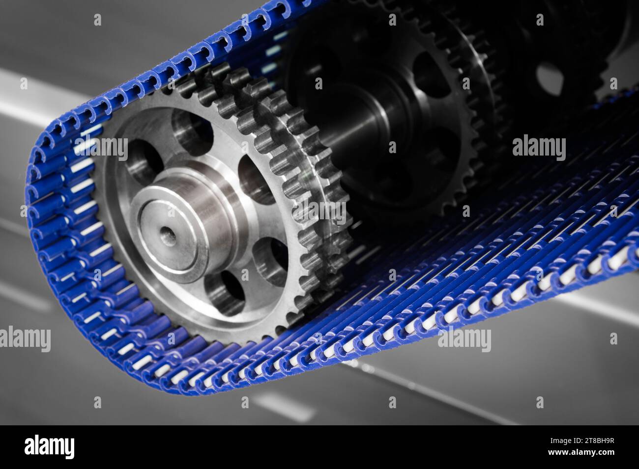 Gear chain drive shaft in conveyor belt is on production line. Timing ...