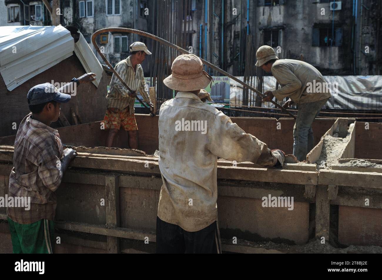 01.10.2013, Yangon, Myanmar, Asia - Workers work at a construction site ...