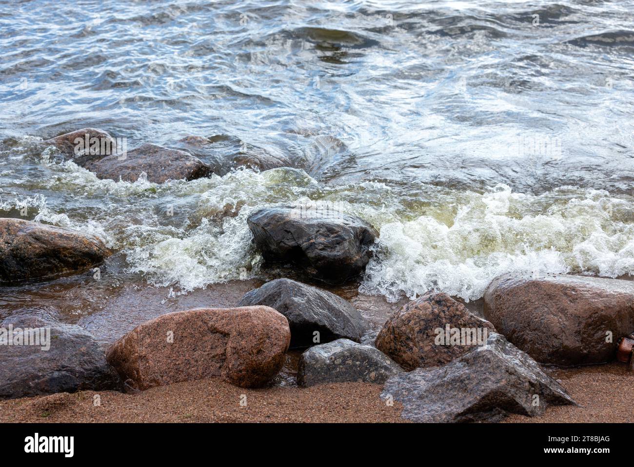 Rocks wet sea hi-res stock photography and images - Alamy