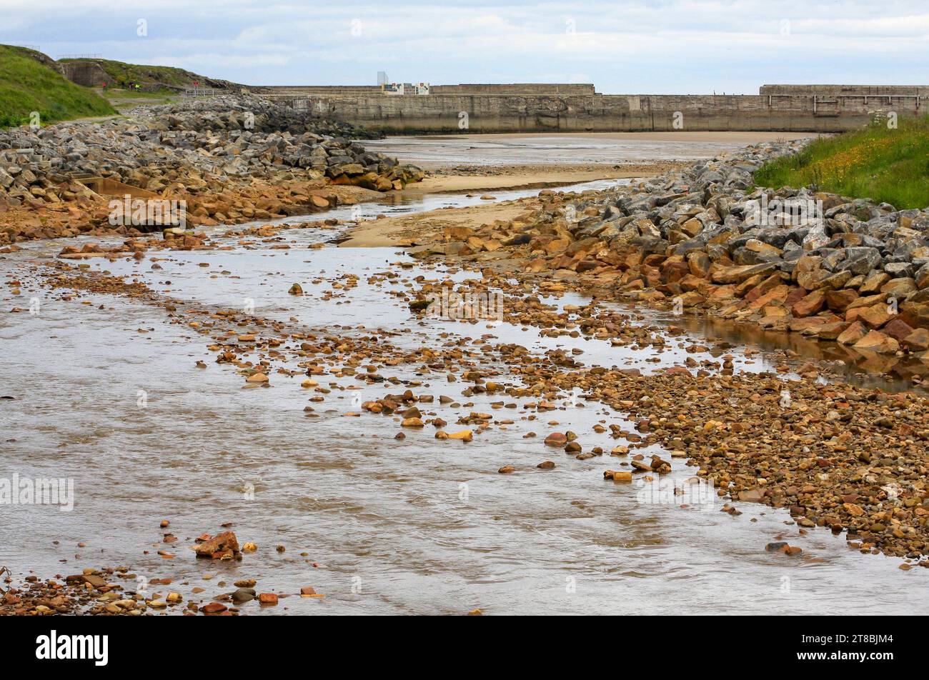 The beach and seafront at Skinningrove,England,UK with the large rocks ...