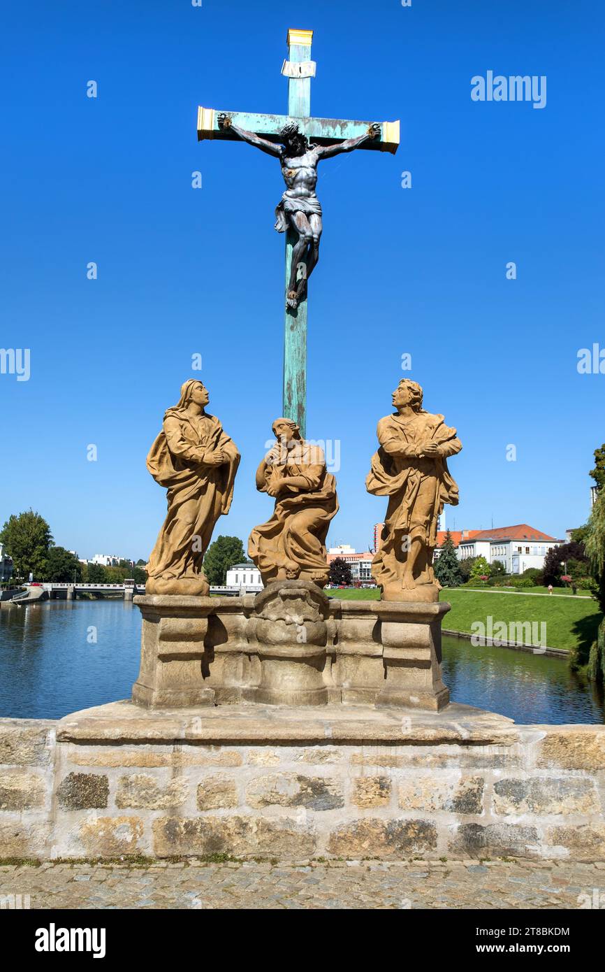 statues on the oldest historic stone bridge in the Pisek town in local ...