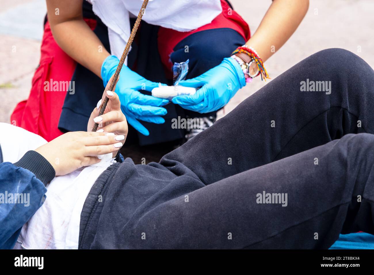 First aid after serious abdominal or stomach injury Stock Photo - Alamy