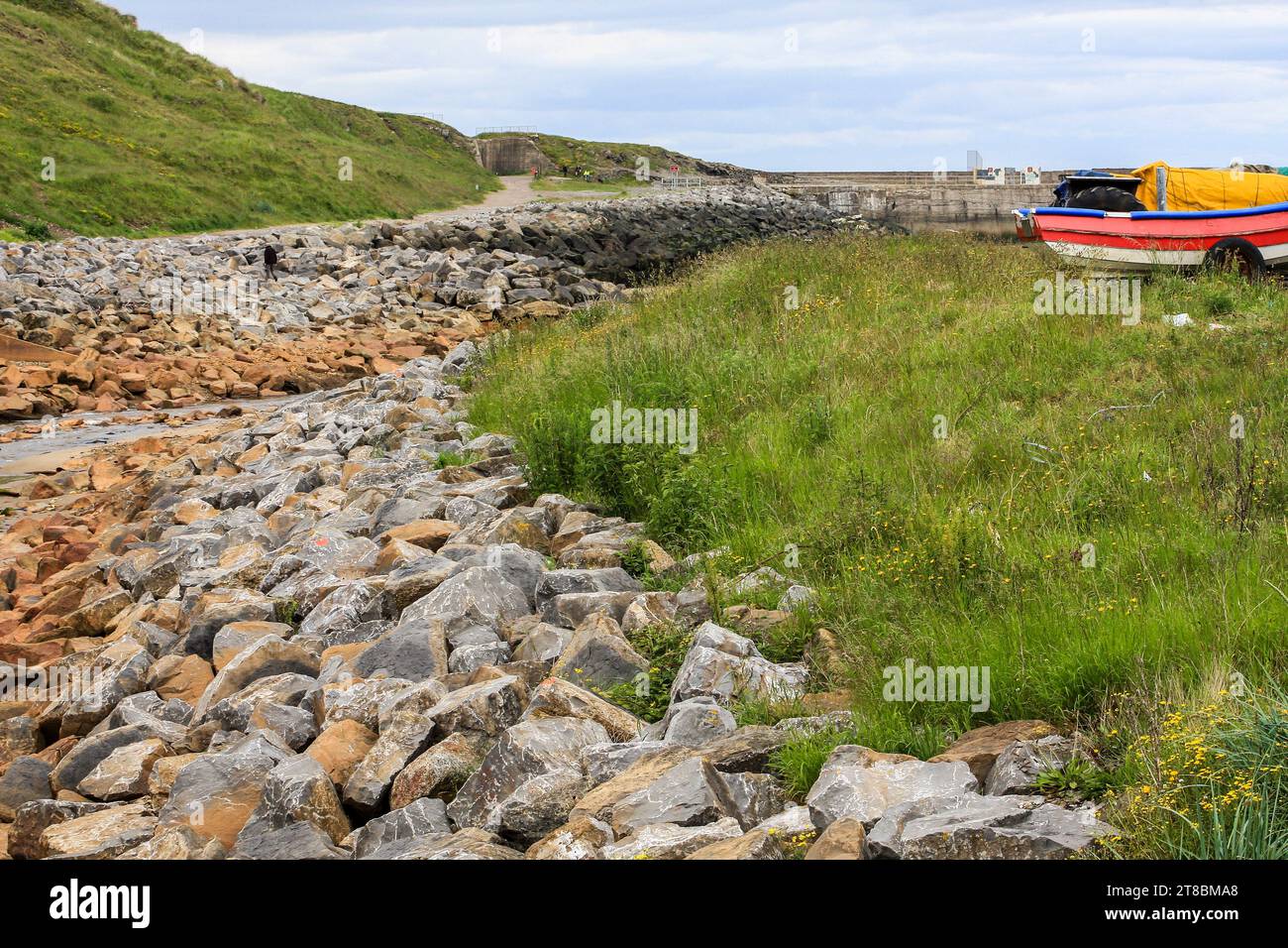 The beach and seafront at Skinningrove,England,UK with the large rocks ...