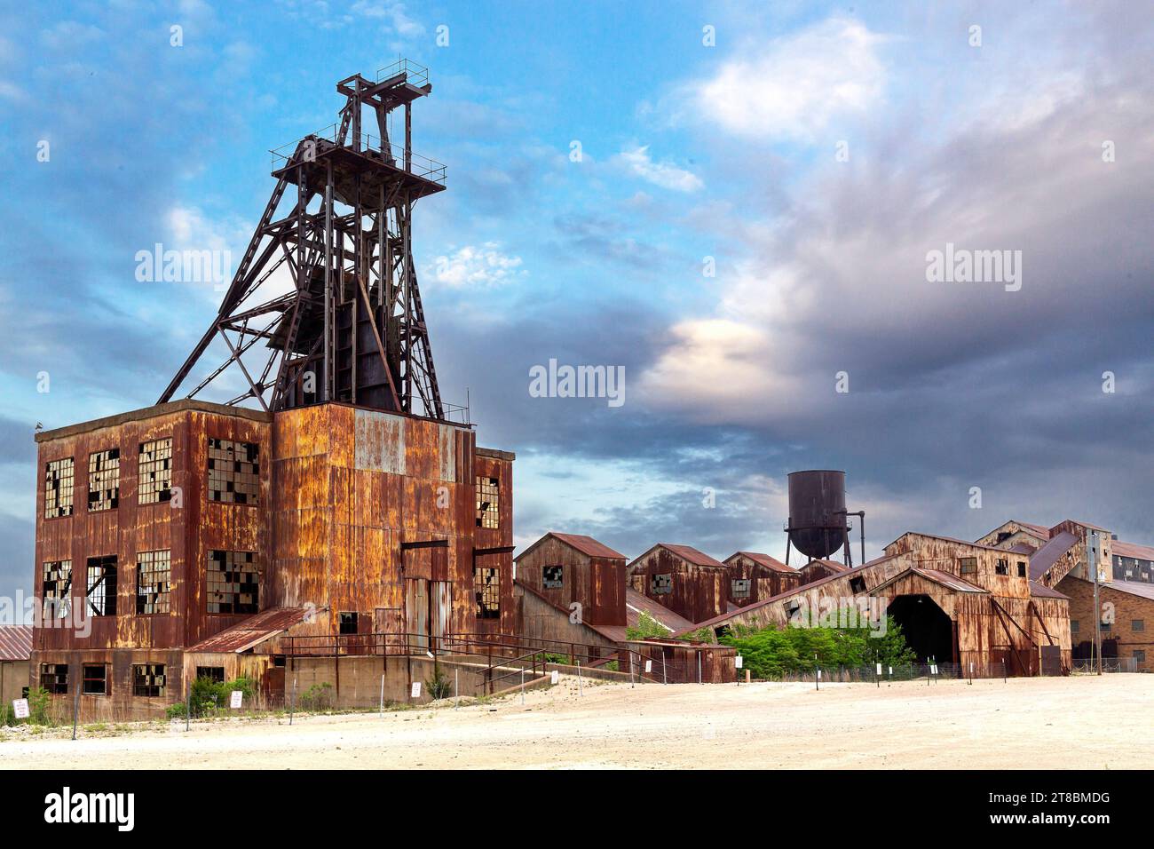 Landscape with abandoned mining facilities and buildings at the Missouri Mines State Historic ...