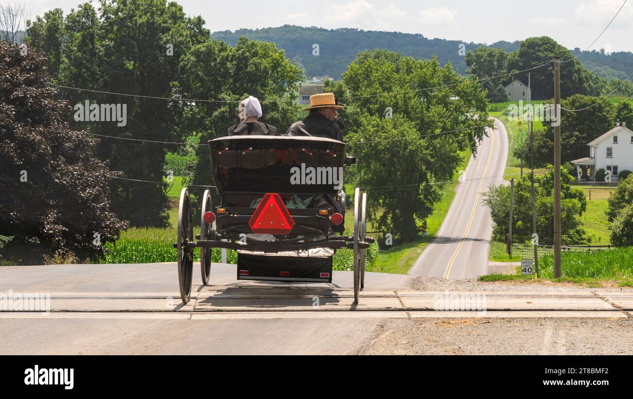 Ronks, Pennsylvania, July 23, 2023 - A Rear View of an Amish Couple in ...