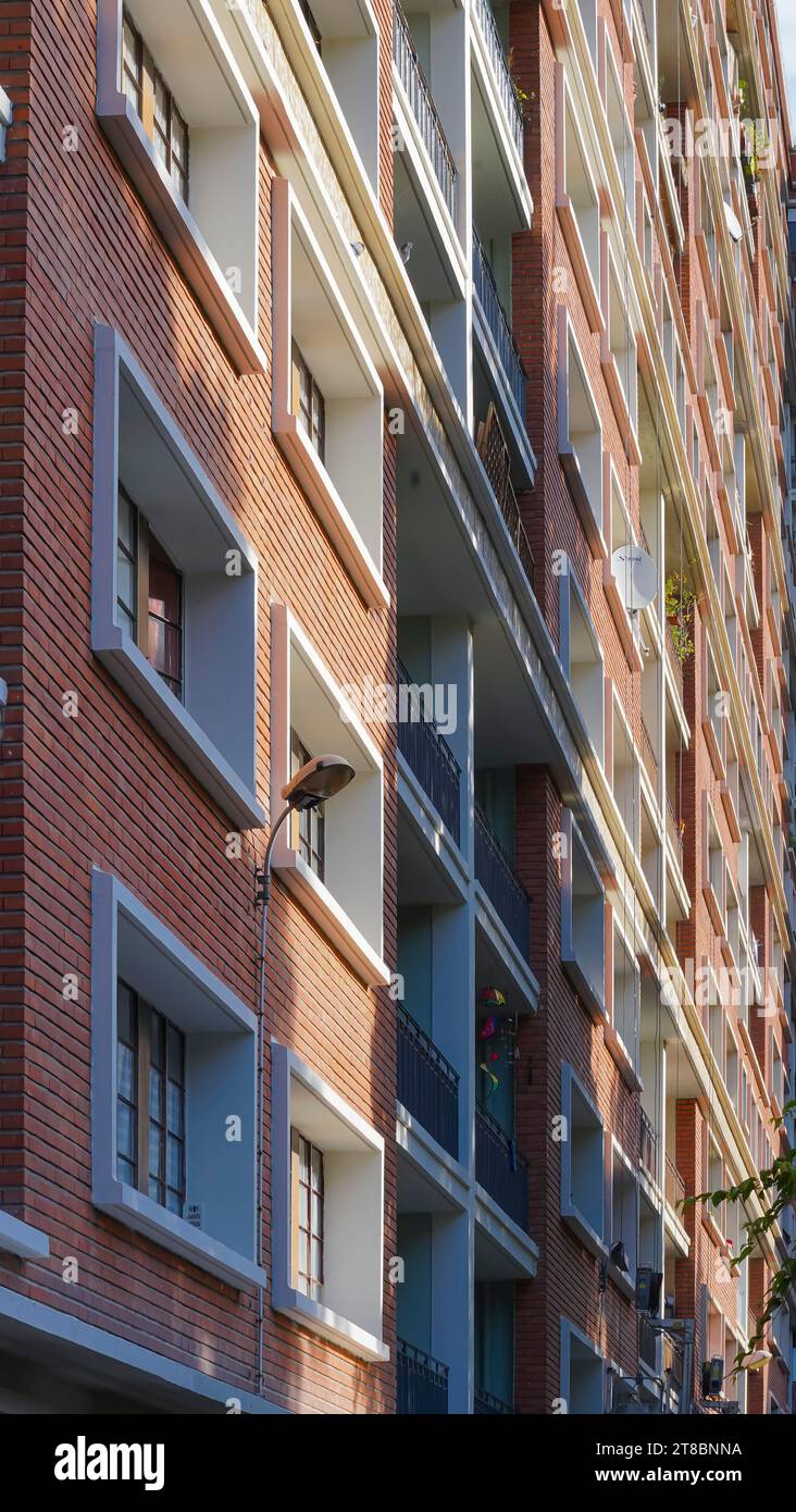 Ivry-sur-Seine, France - 09 30 2021: View of the facade of a red brick ...