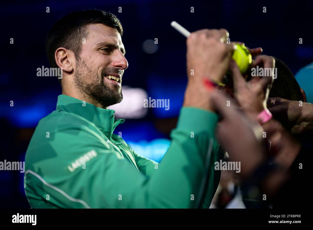 Turin, Italy. 19 November 2023. Novak Djokovic of Serbia signs autographs at the end of the ...