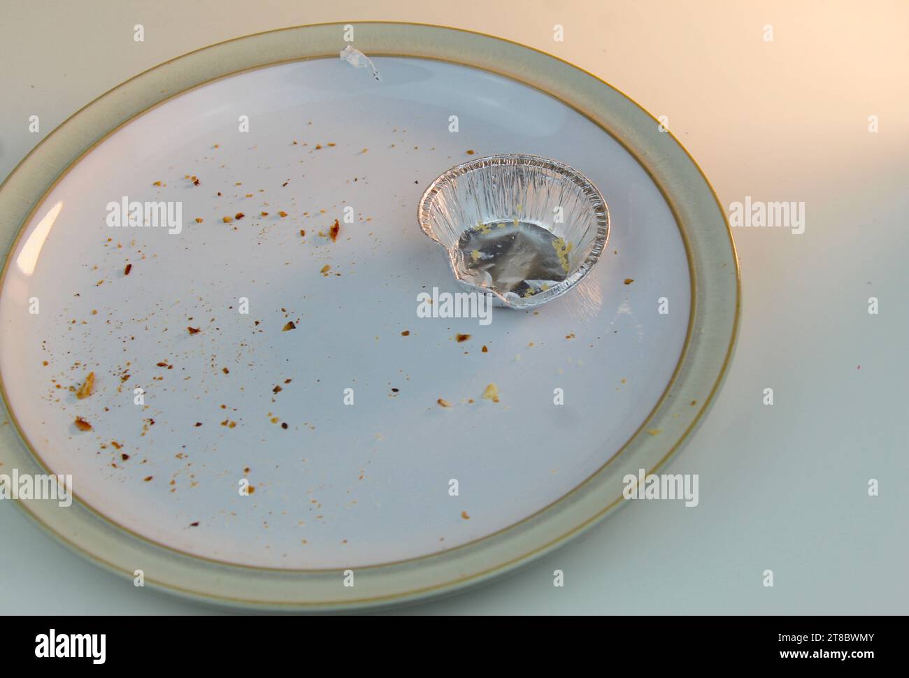 Empty plate with crumbs hi-res stock photography and images - Alamy