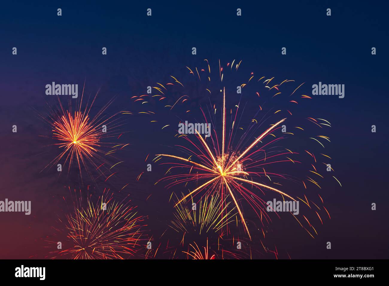 Colorful fireworks on night sky background. Celebration and holidays ...