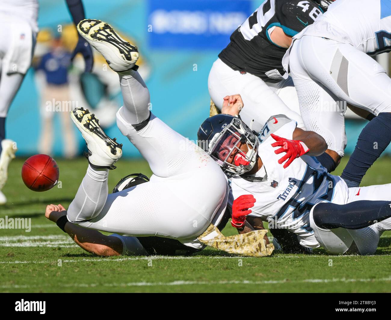 November 19, 2023: Tennessee Titans cornerback Eric Garror (33) fumbles ...