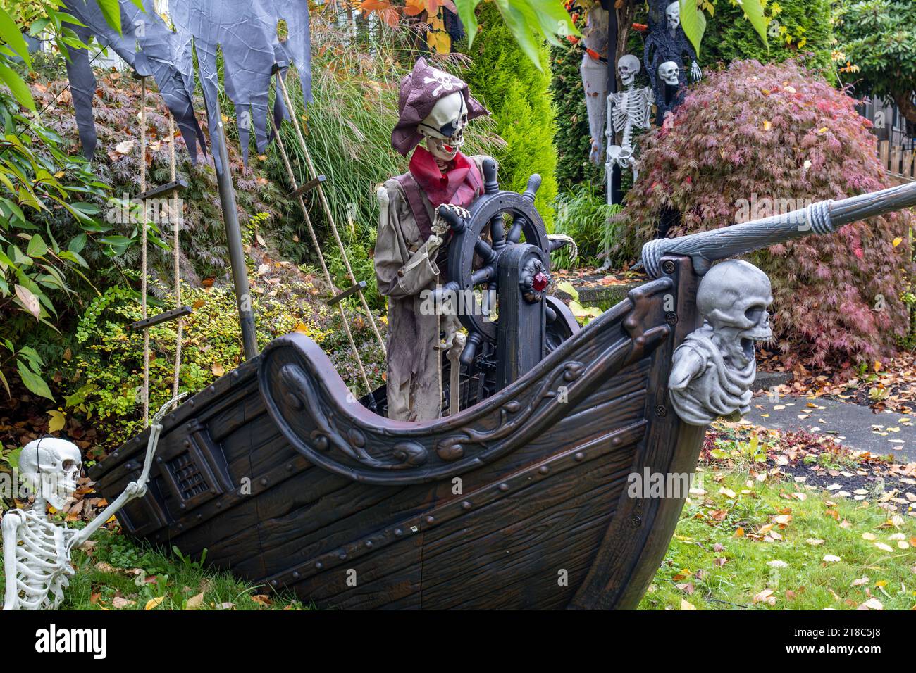 Pirate ship skeleton front yard halloween decorations Stock Photo - Alamy