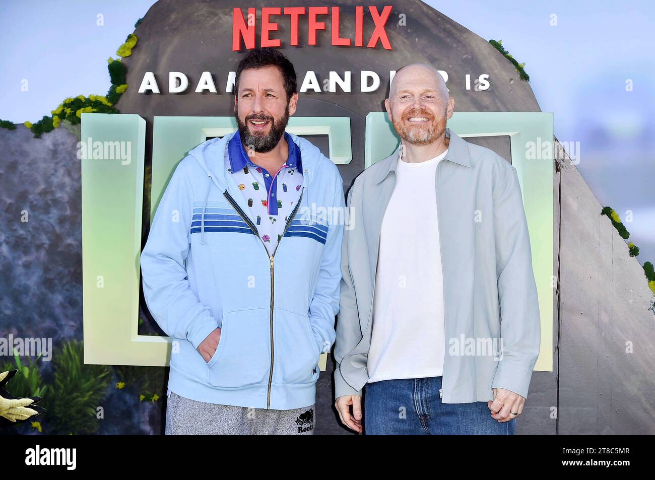 Adam Sandler, left, and Bill Burr arrive at the premiere of "Leo ...