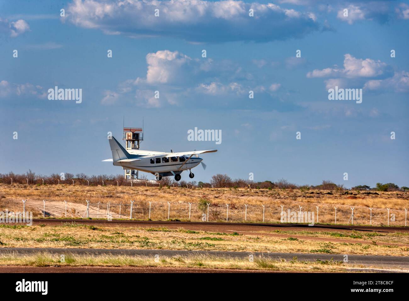 small airport, passenger plane taking off, control tower Stock Photo ...