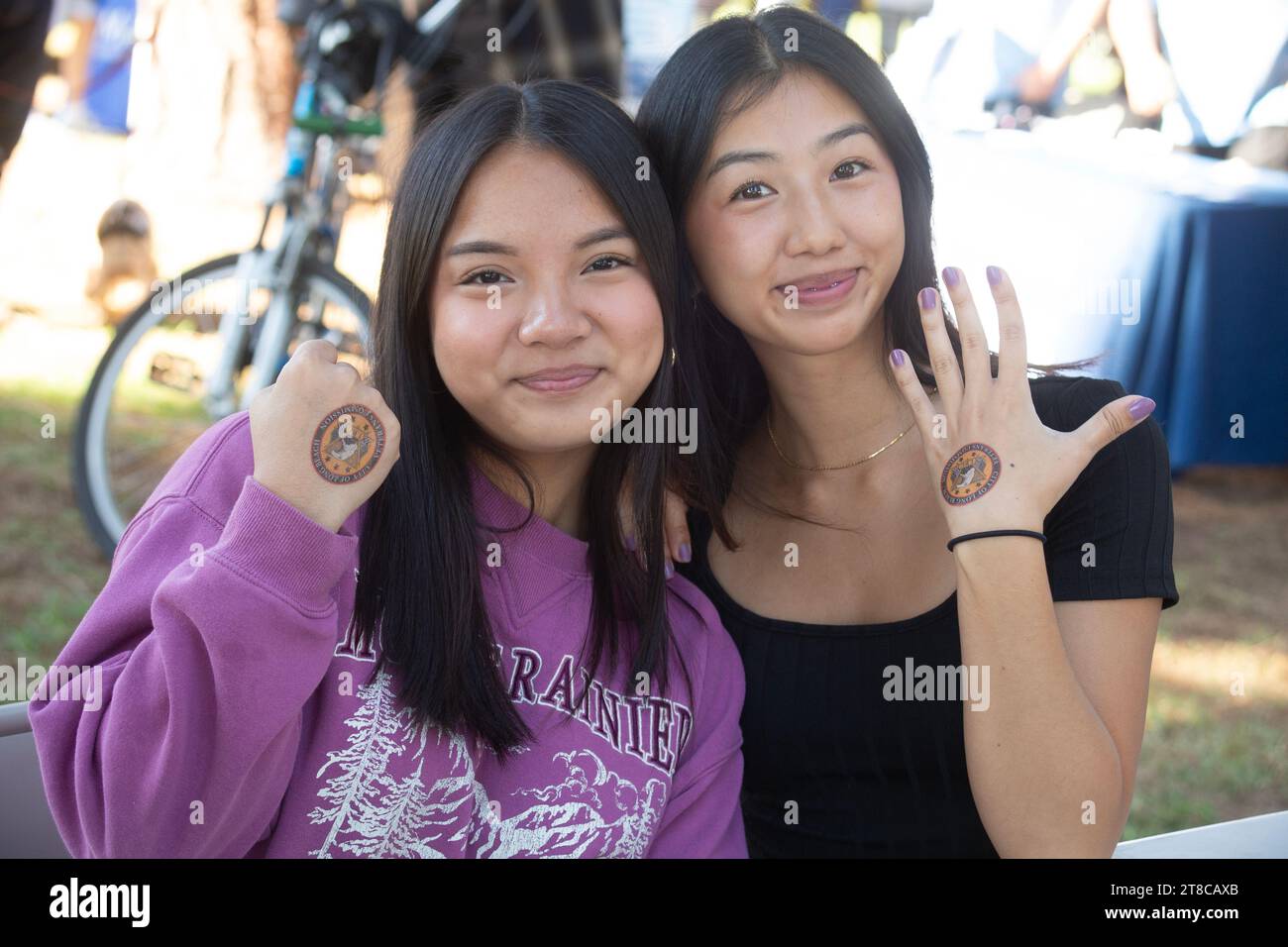 Two Asian-American college students volunteering at the Long Beach ...